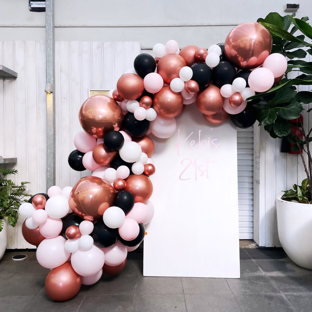 Solid Arch Backdrop with Balloon Garland – Balloons Etc